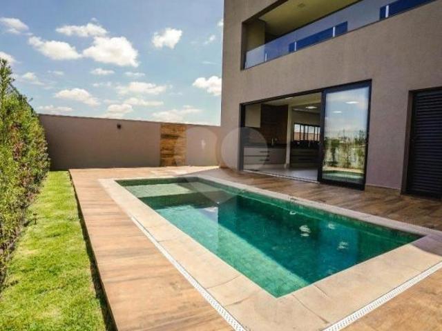 Casa à venda com 4 suítes no condomínio Quinta Dos Ventos, Ribeirão Preto