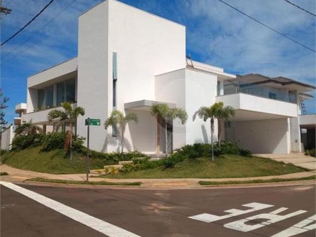 Casa à venda com 4 suítes no condomínio Residêncial Damha III, São Carlos