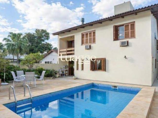 Casa à venda com 5 dormitórios, 392m² e 4 vagas no bairro Vila Assunção, Zona Su