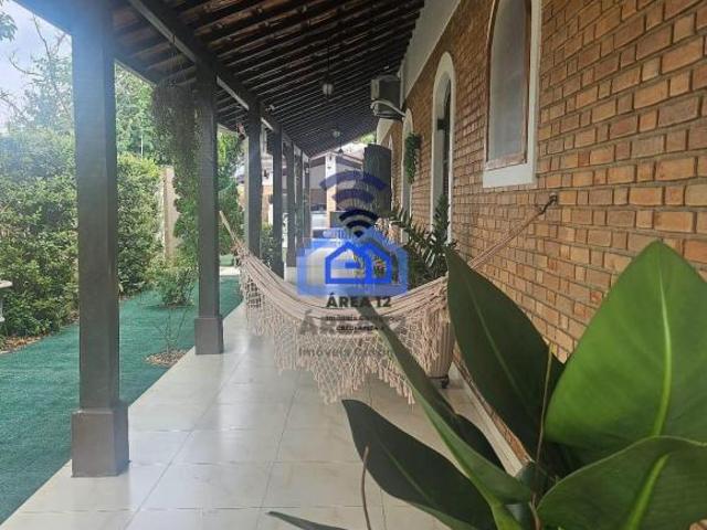 Casa à venda com 5 dormitórios sendo 3 suítes, piscina e área gourmet no bairro Caputera em Caraguat