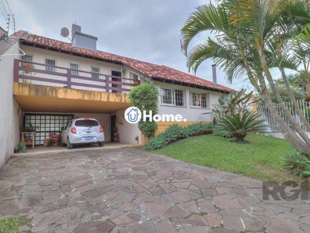 Casa a venda composta de 4 dormitórios no bairro Jardim Isabel em Porto Alegre