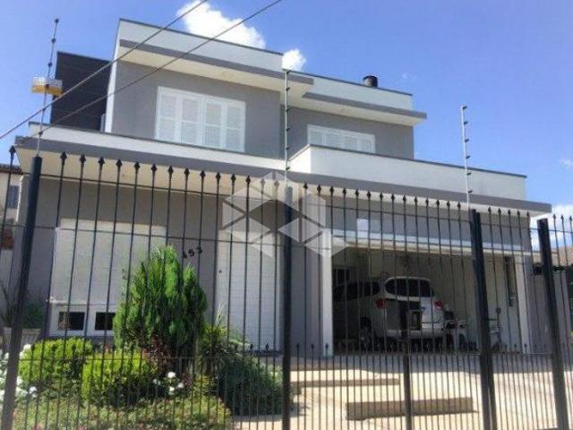 Casa à venda de 3 quartos à venda no bairro Juscelino Kubitschek, Santa Maria, RS