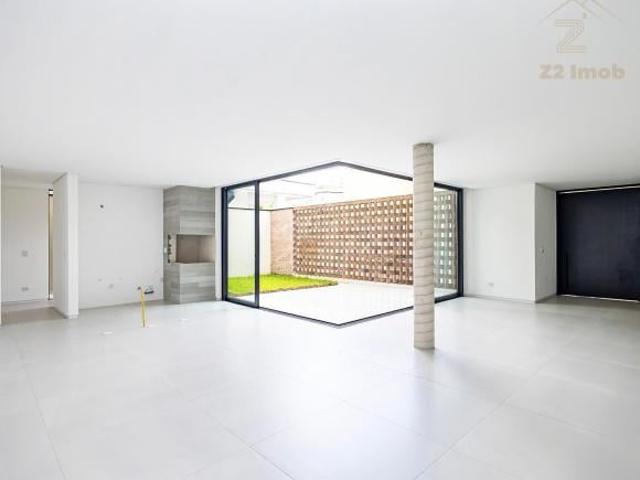 Casa à venda, de alto padrão, face norte, em condomínio fechado no Campo Comprido, CURITIBA PR