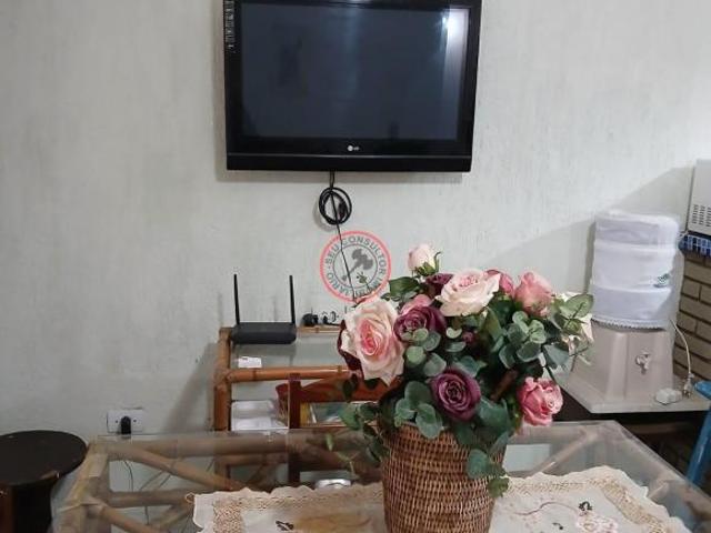 CASA A VENDA DENTRO DE CONDOMÍNIO EM FRENTE A PRAIA, COM 2 DORMITÓRIOS,VARANDA, JARDIM, CHURRASQUEIR