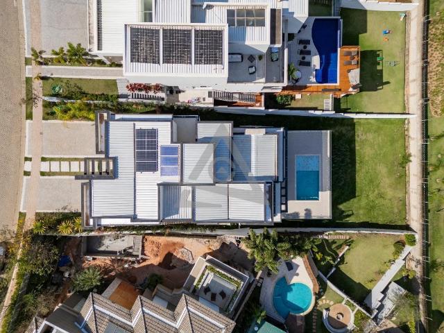 Casa à venda e para alugar em Campinas, Residencial Jatibela, com 4 suítes, com 525 m²