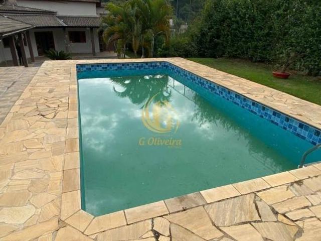 Casa a Venda em condomínio, 4 quartos, 3 suítes, A/C 298m² A/T 1.000m2