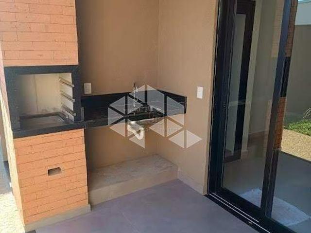 CASA Á VENDA EM CONDOMINIO 3 SUITES 4 VAGAS