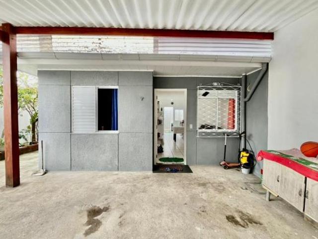 Casa à Venda em condomínio Vitória Park Morrinhos no Guarujá I Omega Imóveis