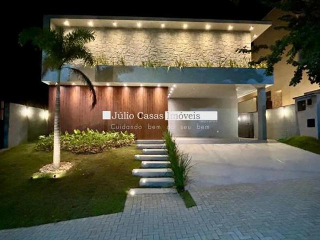 Casa a venda em condomínio com 3 suítes