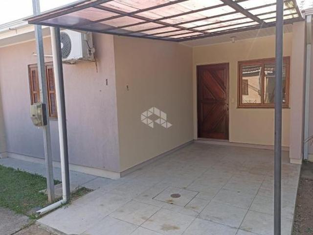 Casa a Venda em condomínio com 2 dormitórios, sala, cozinha, banheiro, garagem