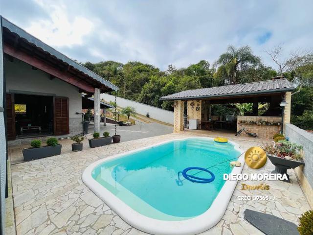 Casa à venda em condomínio de Bom Jesus dos Perdões escriturado
