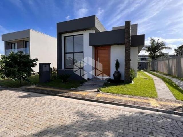 Casa à venda em Condomínio de Eldorado do Sul com 3 suítes e 4 vagas