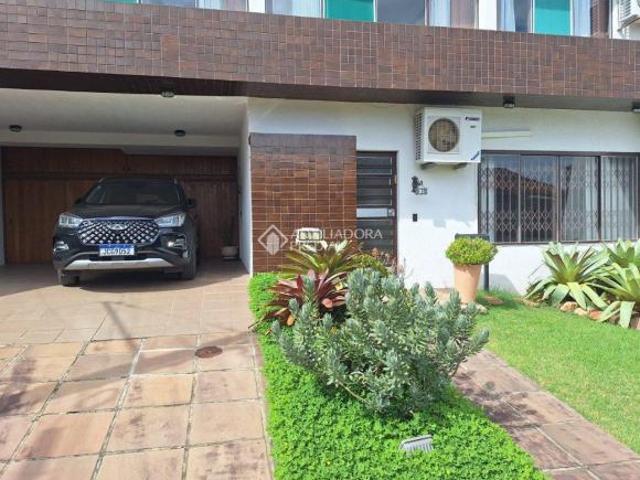 Casa a venda em condomínio, em Porto Alegre, Bairro Santa Tereza, com 698 m2, condomínio com total