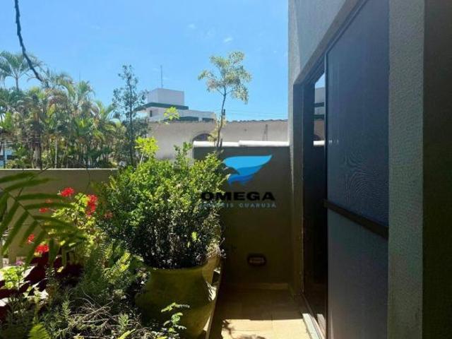 Casa à venda em Condomínio Fechado na Praia das Pitangueiras no Guarujá I Omega Imoveis