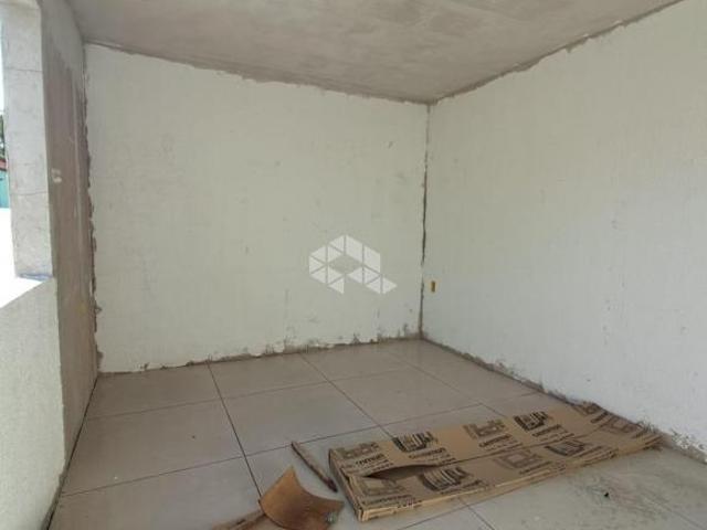 Casa á venda em condomínio Fechado com dois quartos no Bairro Parque Pinheiro Machado em Santa Maria