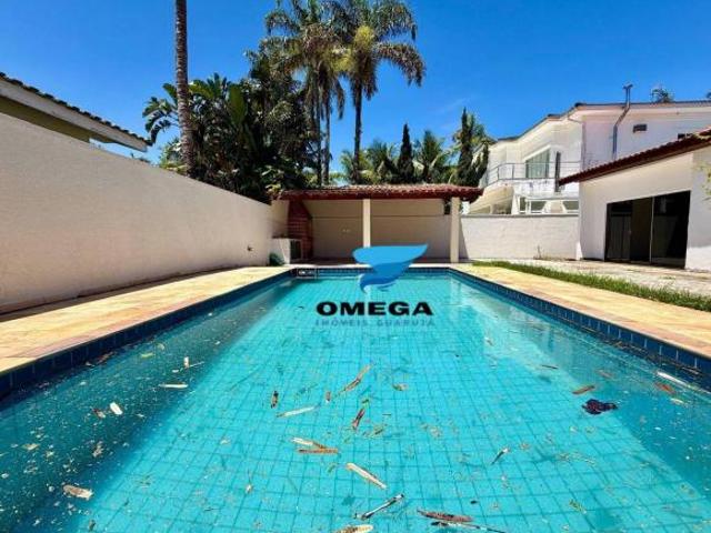 Casa à venda em Condomínio Jardim Acapulco no Guarujá | Omega Imóveis