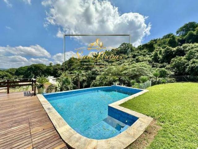 Casa à venda em condomínio na Granja Viana com 4 quartos, piscina e gourmet