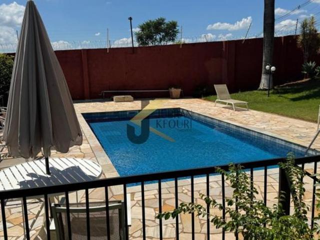 Casa à venda em condomínio no Parque Rural Fazenda Santa Cândida, em Campinas. Com 3 dormitórios, 1
