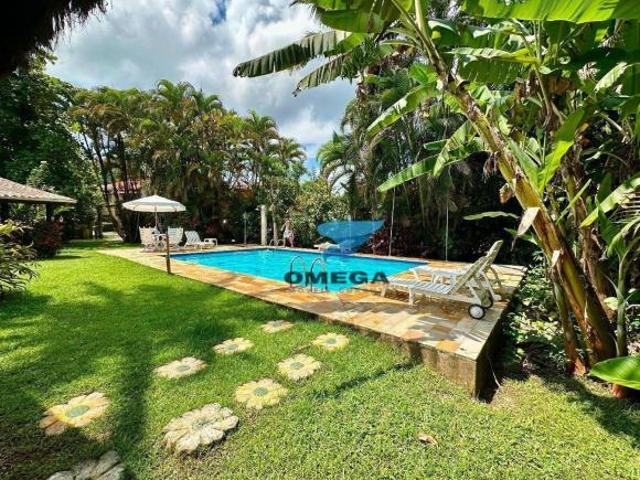 Casa à venda em Condomínio Pernambuco II no Guarujá | Omega Imóveis