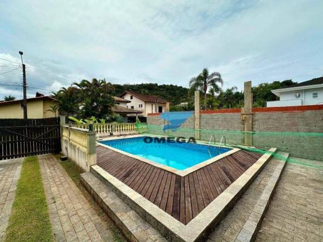 Casa à venda em Condomínio Pernambuco II no Guarujá | Omega Imóveis