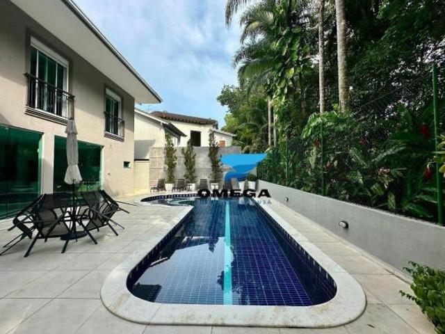 Casa à venda em condomínio Pernambuco II no Guarujá | Omega Imóveis