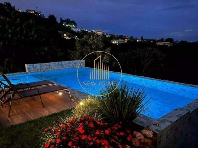 Casa à venda em Conde, Nova Lima – 3 suítes, 520m² de área construída, varanda gourmet e piscina
