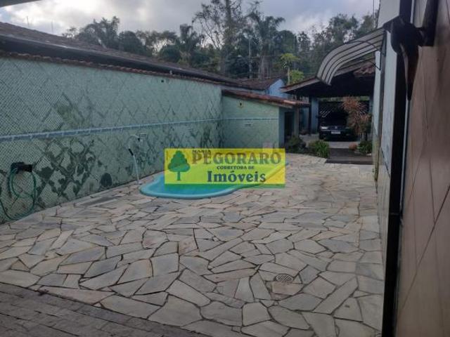 Casa à venda em Caraguatatuba SP, bairro Rio do Ouro: 2 quartos, 2 salas, 2 banheiros, 2 vagas de ga