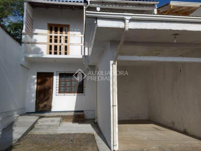 Casa à venda em Alvorada 4 dormitórios