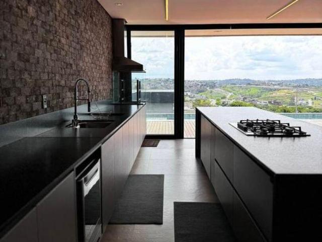 Casa à Venda em Alphaville Vespasiano – 4 Suítes, Piscina e SPA