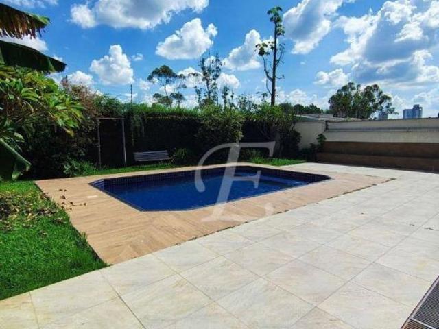 Casa á venda em Alphaville Residencial 1 com 4 dormitórios