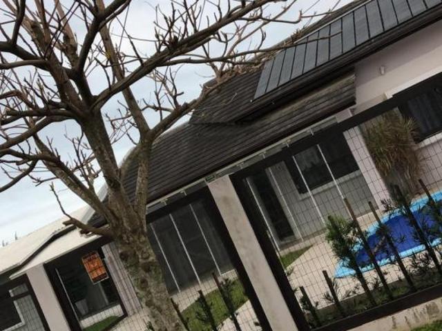 Casa a venda em Arroio do Sal com piscina