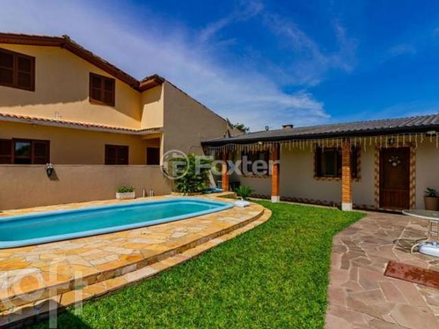 Casa à venda em Belém Novo com 126 m², 2 quartos, 2 vagas