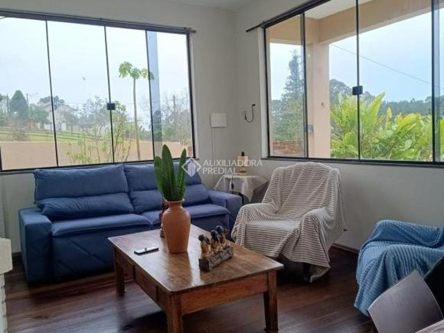 CASA A VENDA EM GRAVATAI 3 QUARTOS SENDO 1 SUITE COM PISCINA