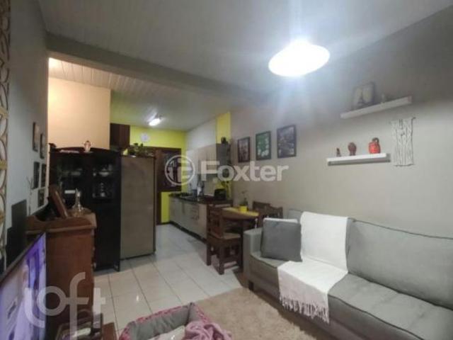 Casa à venda em Guajuviras com 56 m², 2 quartos, 1 vaga