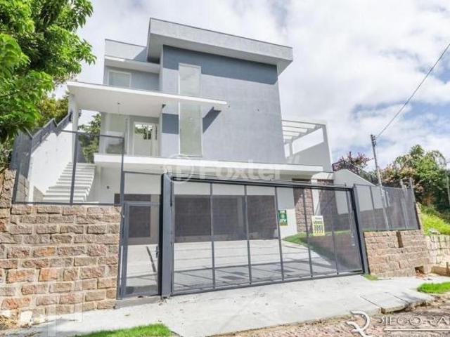 Casa à venda em Ipanema com 286 m², 3 quartos, 1 suíte, 4 vagas