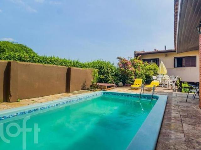 Casa à venda em Ipanema com 560 m², 7 quartos, 2 suítes, 5 vagas