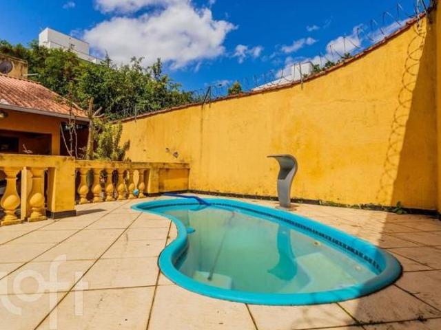 Casa à venda em Jardim Botânico com 194 m², 2 quartos, 1 suíte, 2 vagas