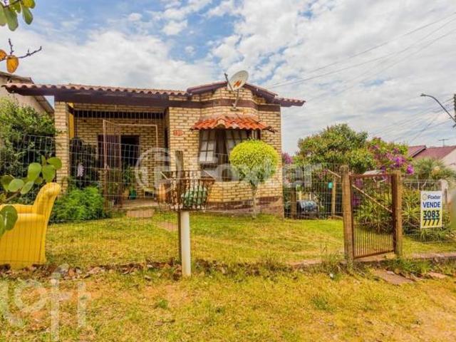 Casa à venda em Lomba do Pinheiro com 65 m², 3 quartos, 3 vagas