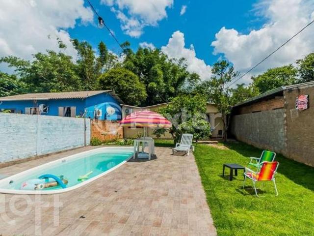 Casa à venda em Lomba do Pinheiro com 98 m², 2 quartos, 1 suíte, 2 vagas