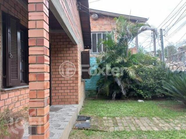Casa à venda em Lomba do Pinheiro com 90 m², 2 quartos, 1 suíte, 5 vagas