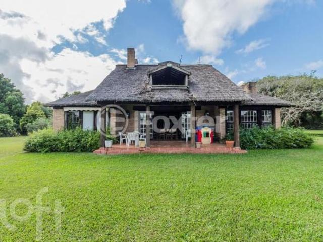 Casa à venda em Lami com 586 m², 4 quartos, 3 vagas
