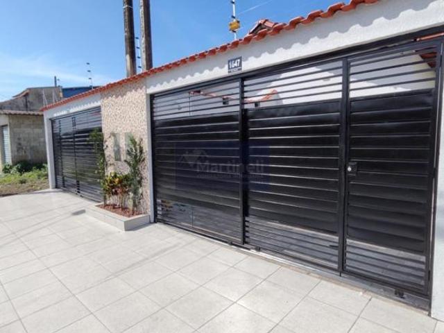 Casa à venda em Mongaguá SP, bairro Jussara: 2 quartos, 1 suíte, 2 vagas de garagem, 67m². Aproveite