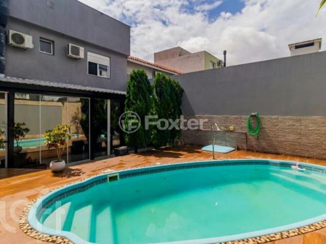 Casa à venda em Mário Quintana com 200 m², 3 quartos, 1 suíte, 2 vagas