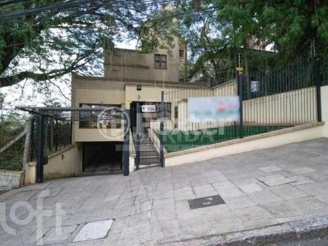 Casa à venda em Menino Deus com 373 m², 4 quartos, 1 suíte, 3 vagas