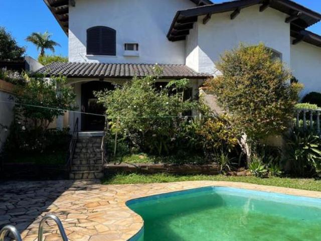 Casa à venda em Novo Hamburgo, Bairro Boa Vista, com piscina privativa e churrasqueira