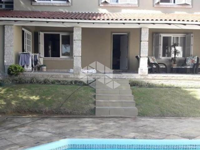Casa à venda em São Lucas, Viamão ? Conforto e lazer no Condomínio Cantegril II
