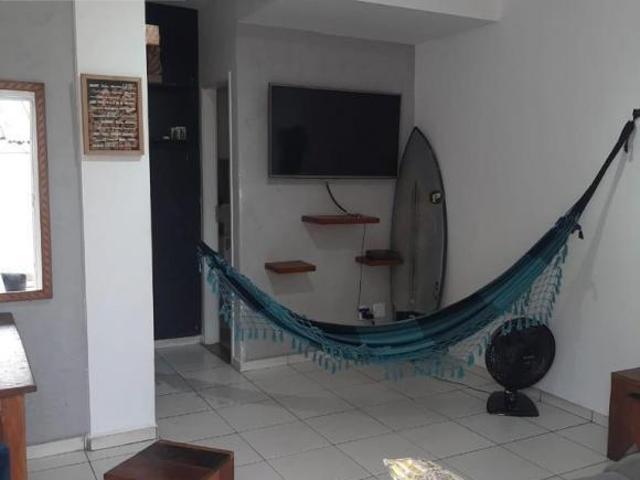 Casa à venda em São Vicente SP, bairro Catiapoa: 2 quartos, 1 suíte, 1 sala, 1 vaga de garagem, 98m²