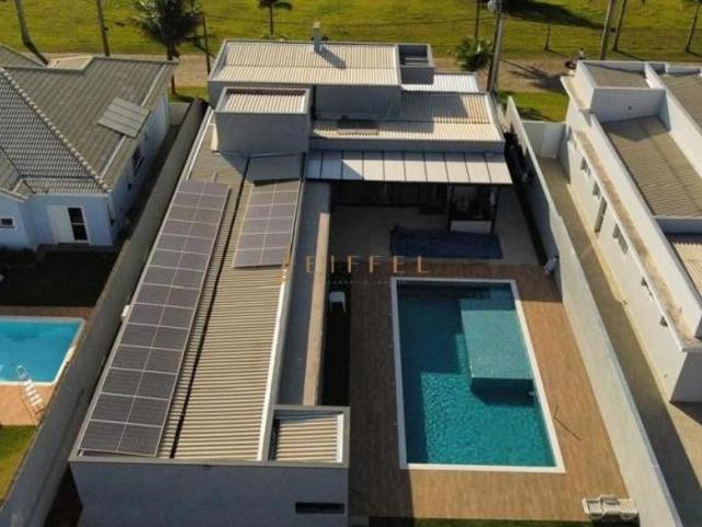Casa à venda em Sorocaba, Condomínio Vivendas do Lago, com 4 suítes, com 400 m²