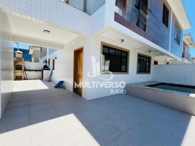 Casa à venda em Santos, Vila Belmiro – 3 suítes, 3 vagas, piscina e churrasqueira