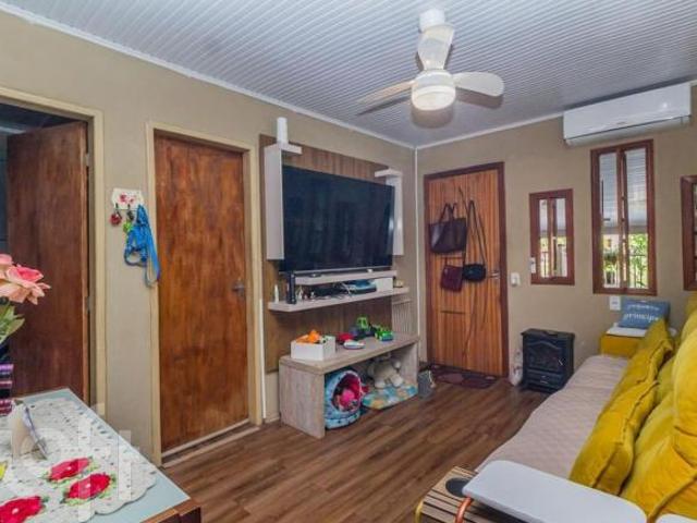 Casa à venda em Sarandi com 63 m², 3 quartos, 1 vaga